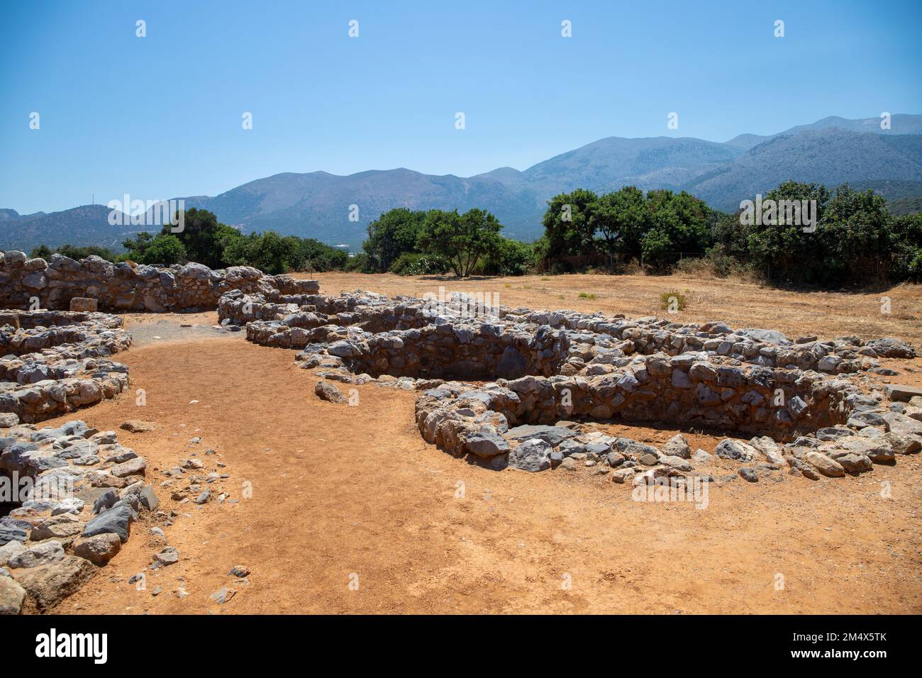 Ancient archaeological site in Crete with stone ruins. High quality ...