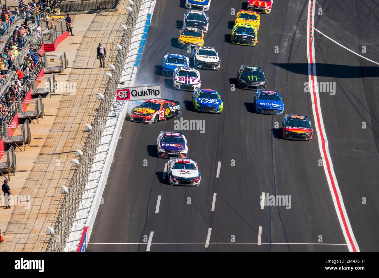 Austin Dillon and Kyle Busch crashes while racing for position for ...