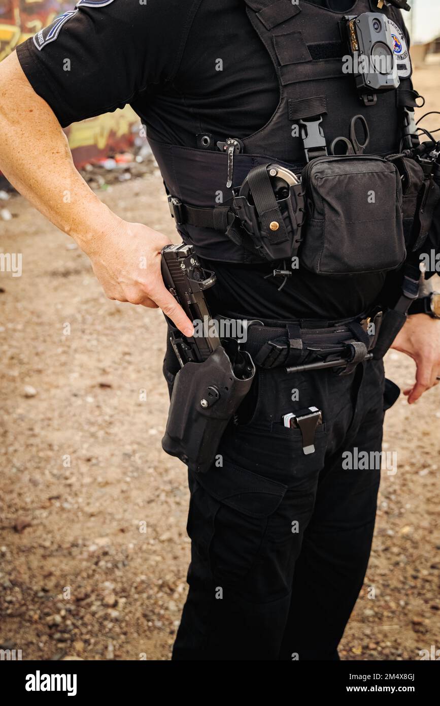 Uniform on duty officer weapon hi-res stock photography and images - Alamy