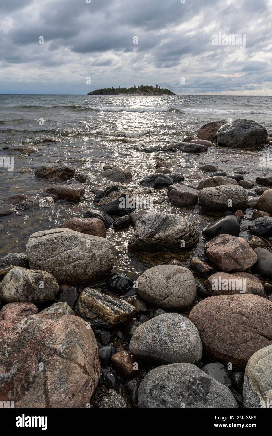 Lake Superior beach with wave rounded rocks, Lake Superior Provincial ...