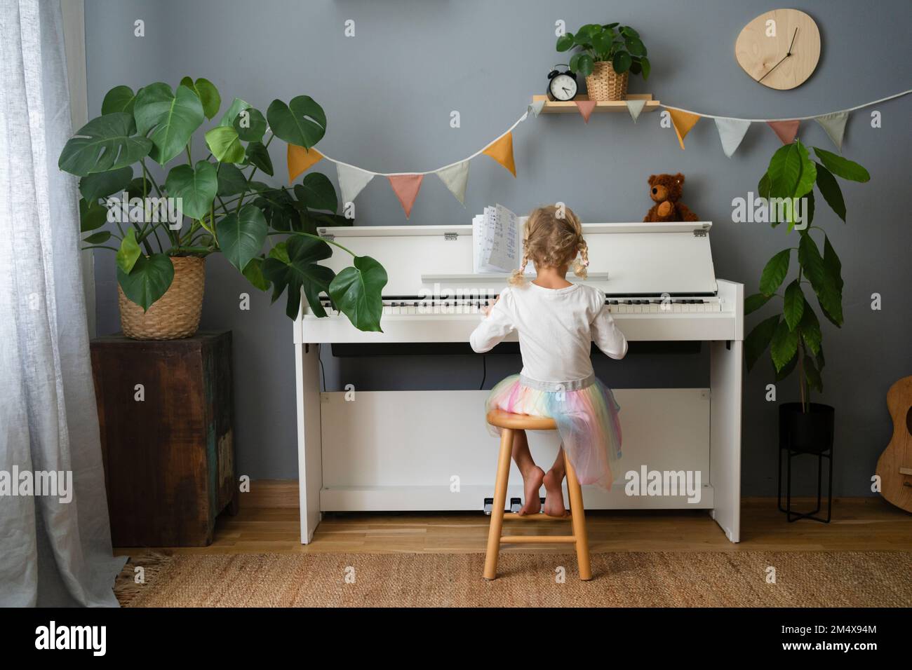 Playing piano home hi-res stock photography and images - Alamy