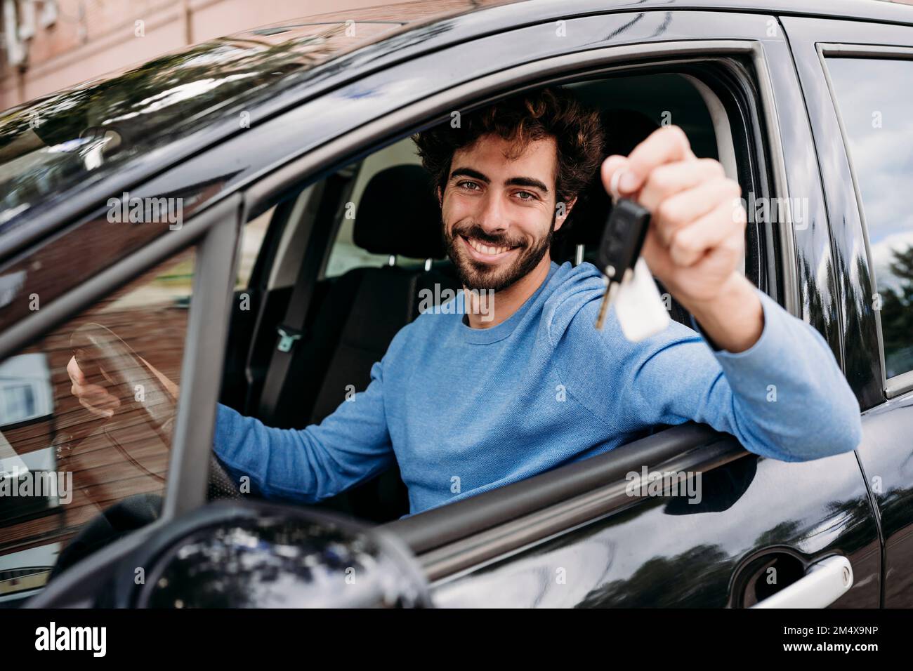 Young man car key hi-res stock photography and images - Alamy