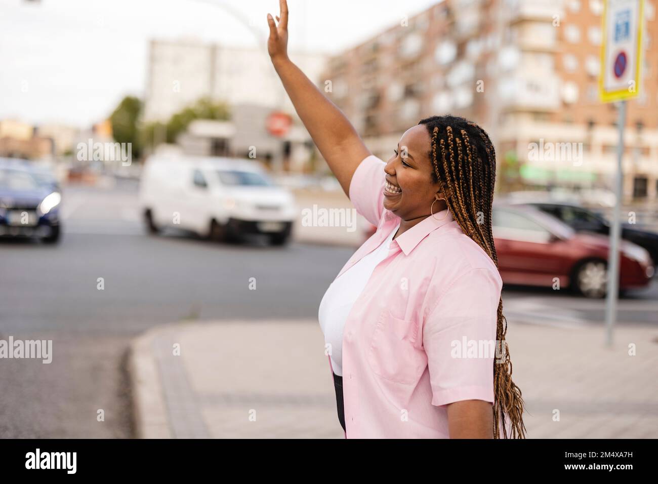 One woman waving arms hi-res stock photography and images - Alamy