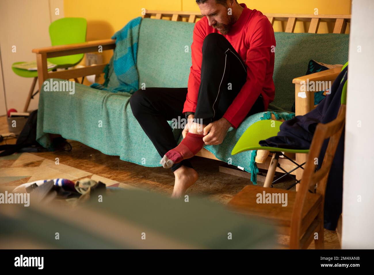 Pulling sock on hi-res stock photography and images - Alamy