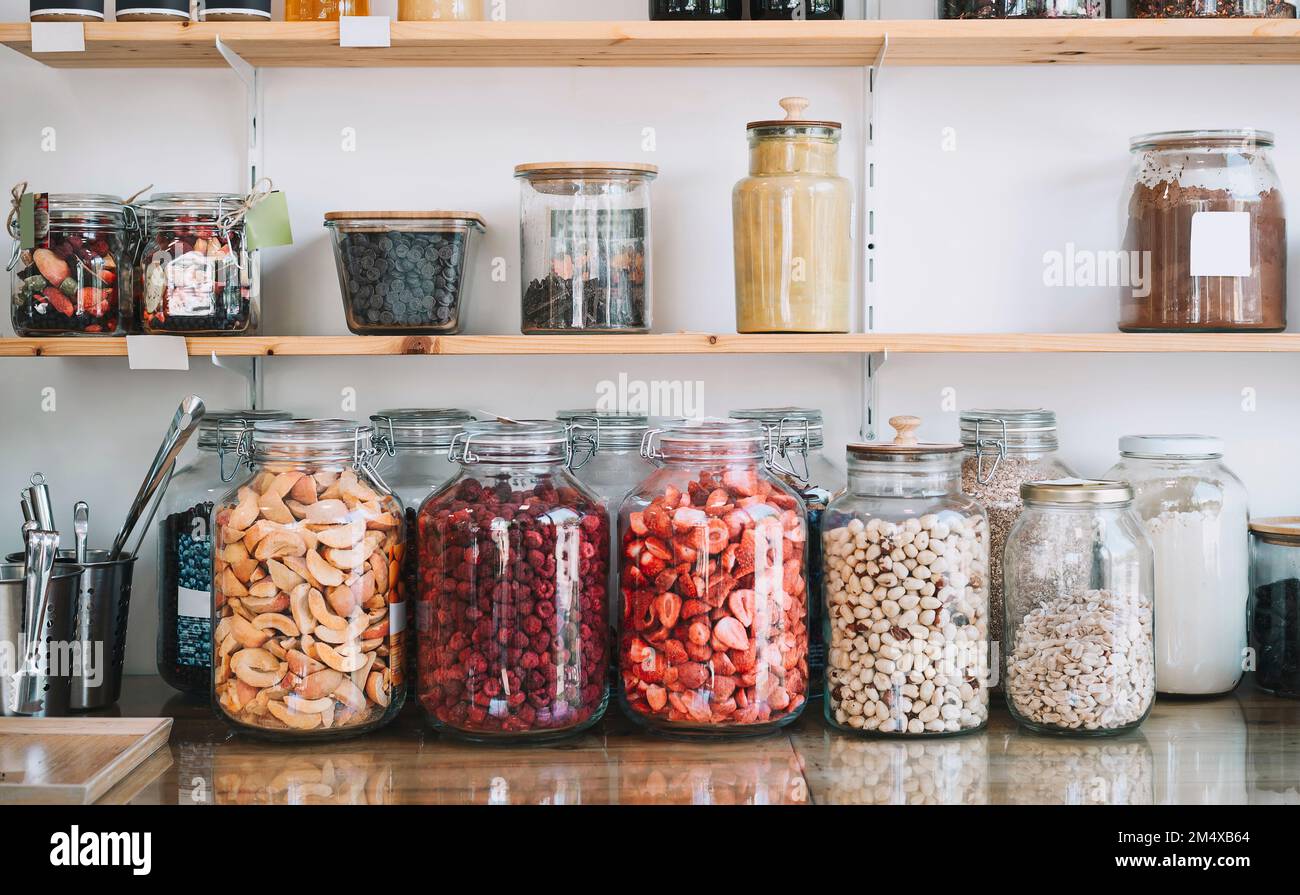 Dried fruits arranged on display in zero waste shop Stock Photo - Alamy