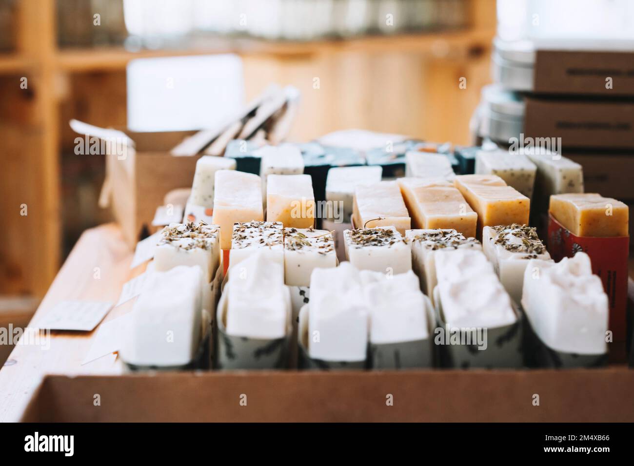 Soap bars arranged in shelf at zero waste shop Stock Photo - Alamy
