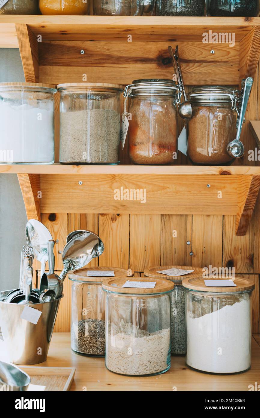 Mason jars arranged on shelf in zero waste shop Stock Photo - Alamy