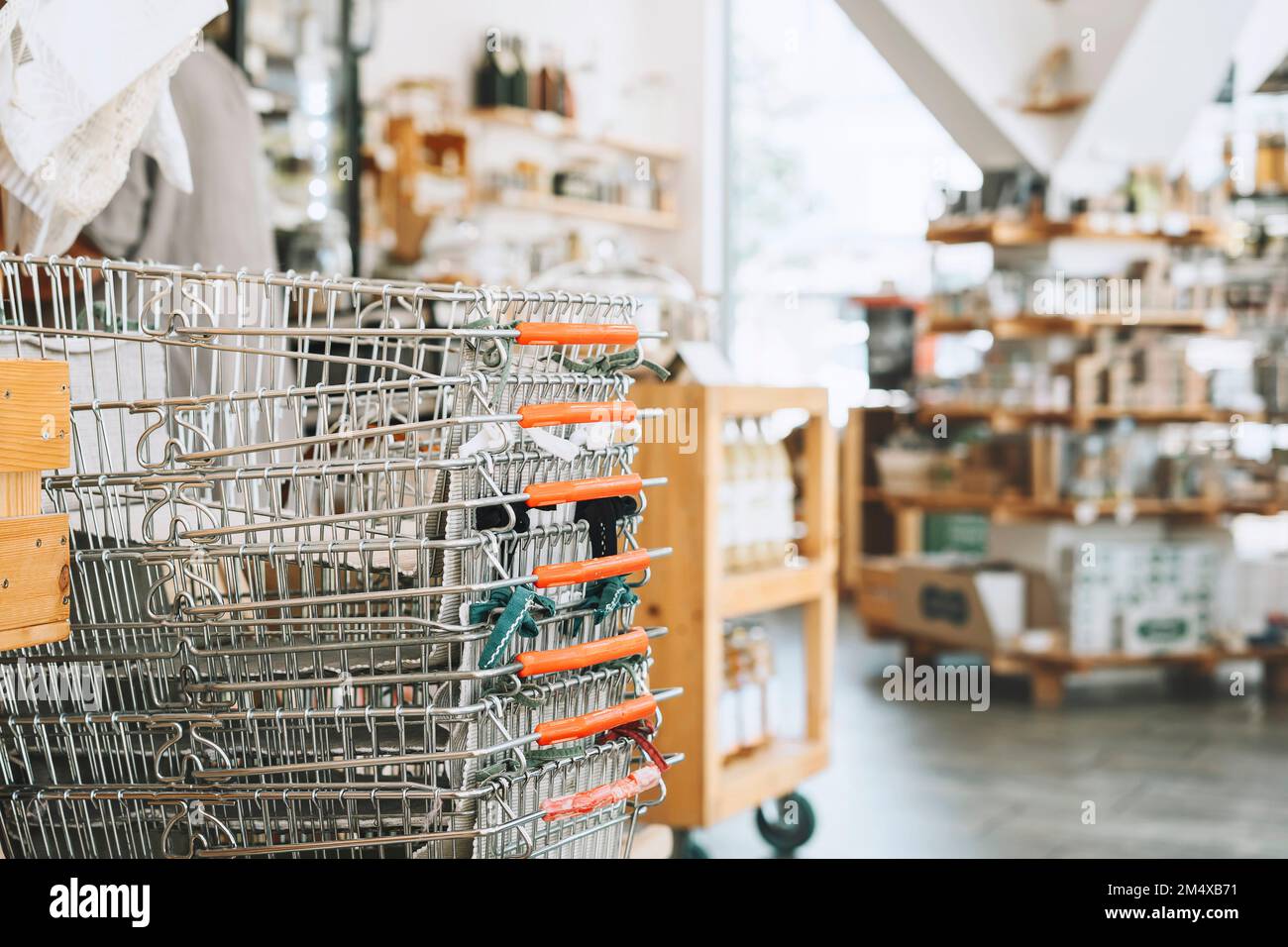Stack of shopping baskets in zero waste shop Stock Photo - Alamy