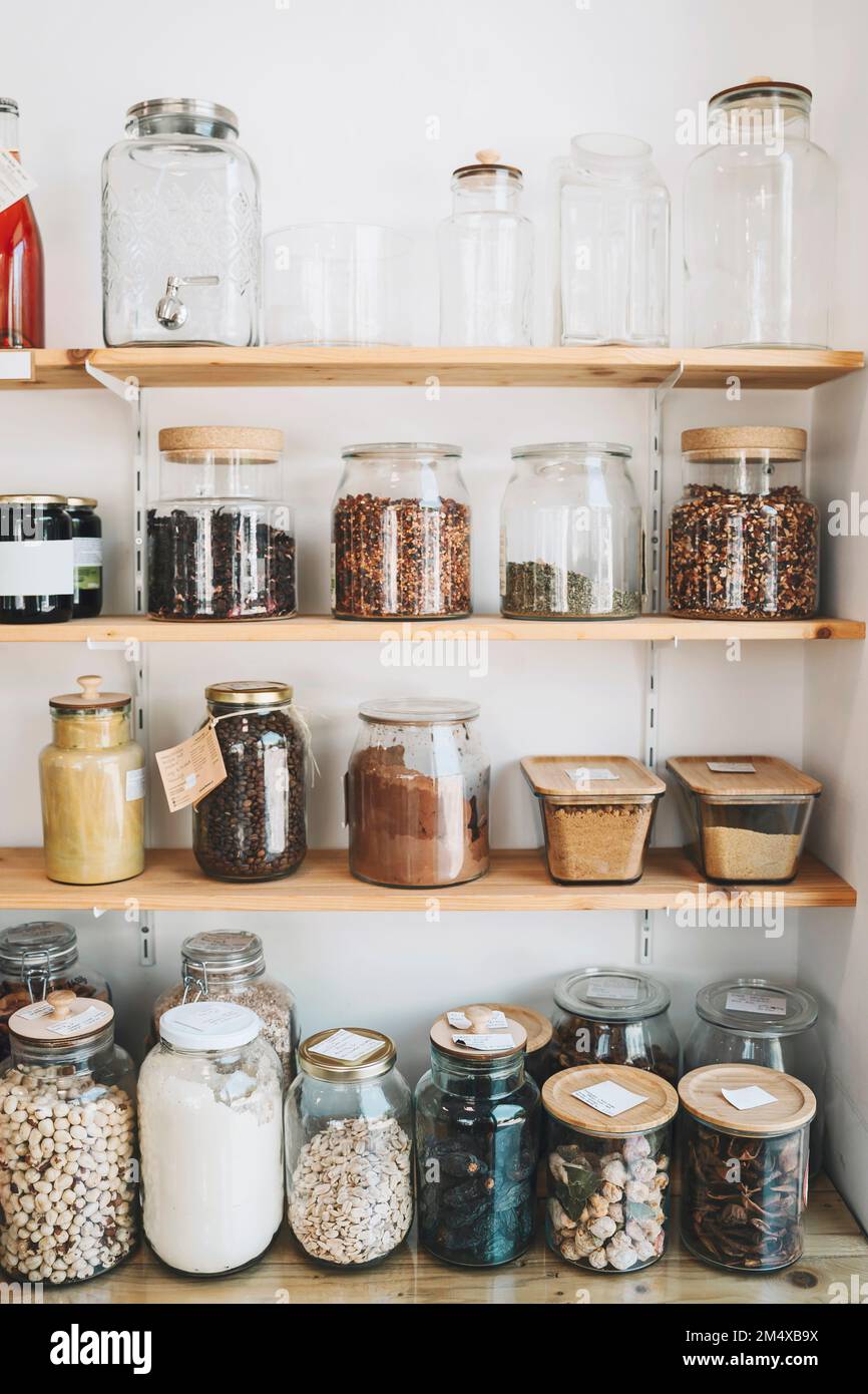 Mason jars arranged on shelves in convenience store Stock Photo - Alamy