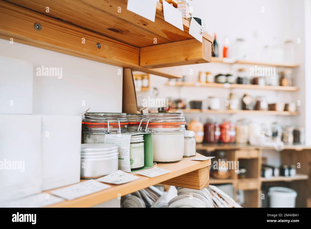 Beauty product jars on shelf in zero waste store Stock Photo - Alamy