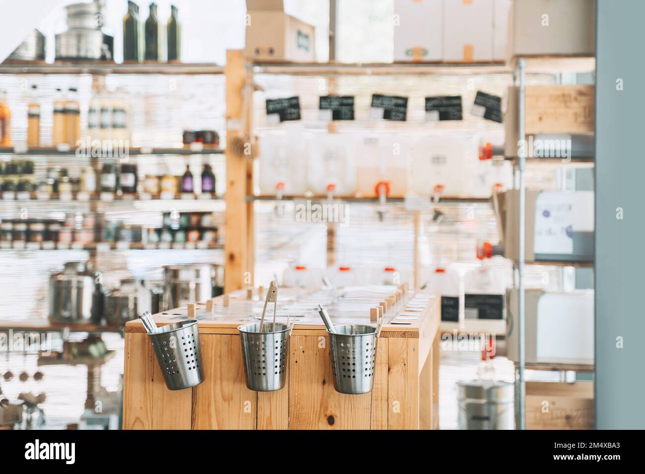 Small containers on counter in supermarket Stock Photo - Alamy