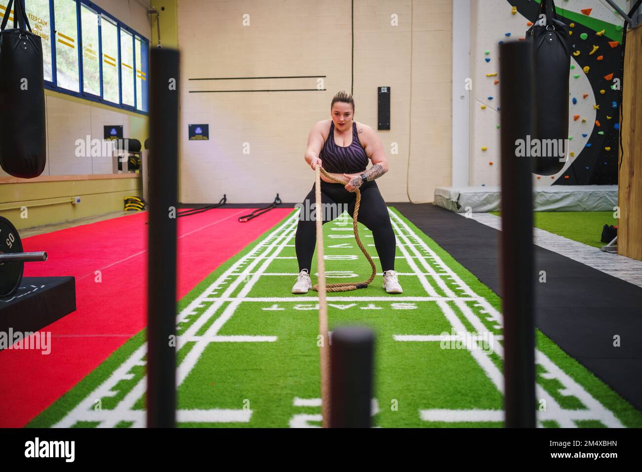 Cross training young woman hi-res stock photography and images - Alamy