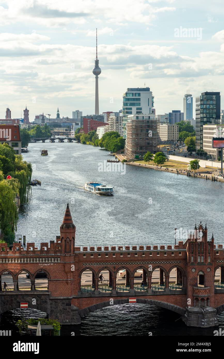 Germany, Berlin, River Spree with Oberbaum Bridge in foreground and ...