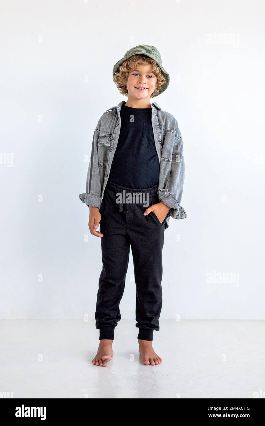 Boy standing with hands in pocket hi-res stock photography and images ...