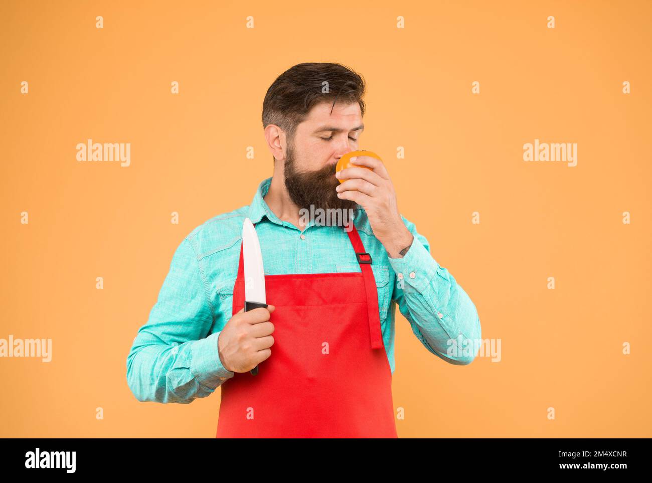 Healthy food cooking. making fresh salad. professional chef in red ...