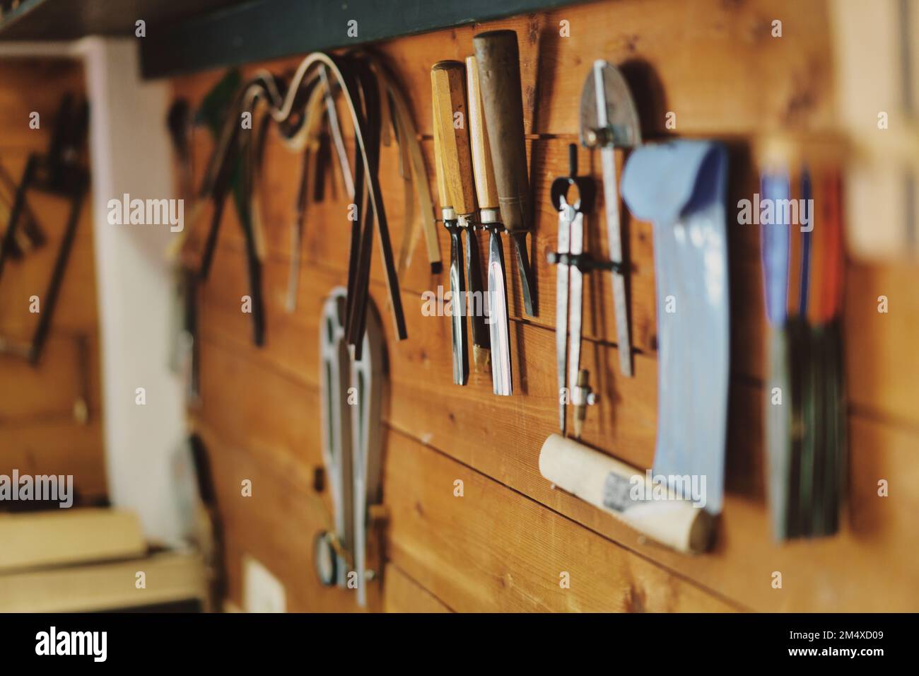 Variety of work tools in workshop Stock Photo - Alamy