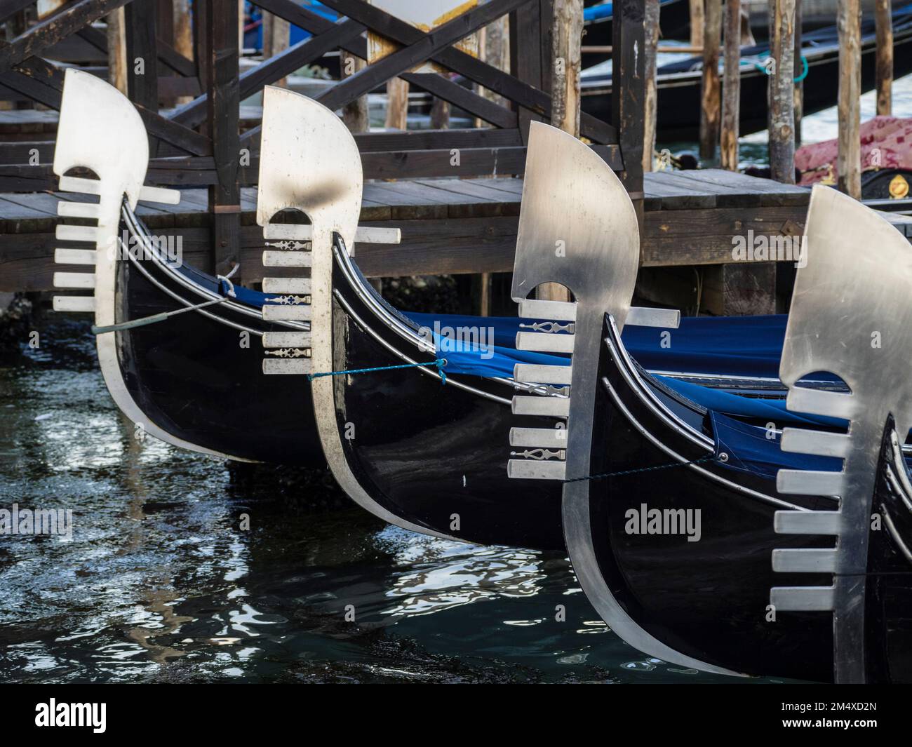 Iron gondola prows, San Marco Basin, Venice, Italy Stock Photo - Alamy
