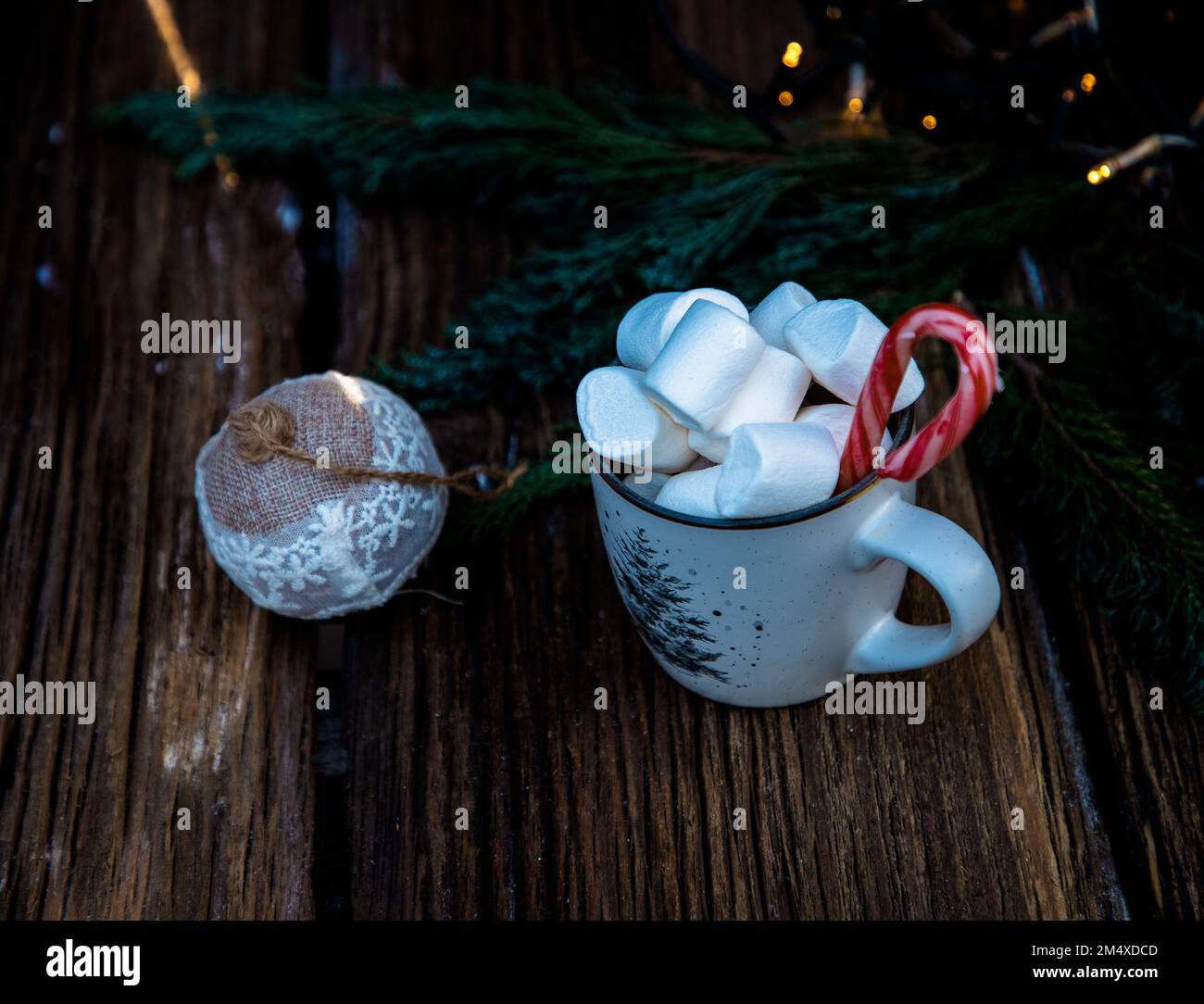 hot Christmas drink with marshmallow on wooden table Stock Photo - Alamy