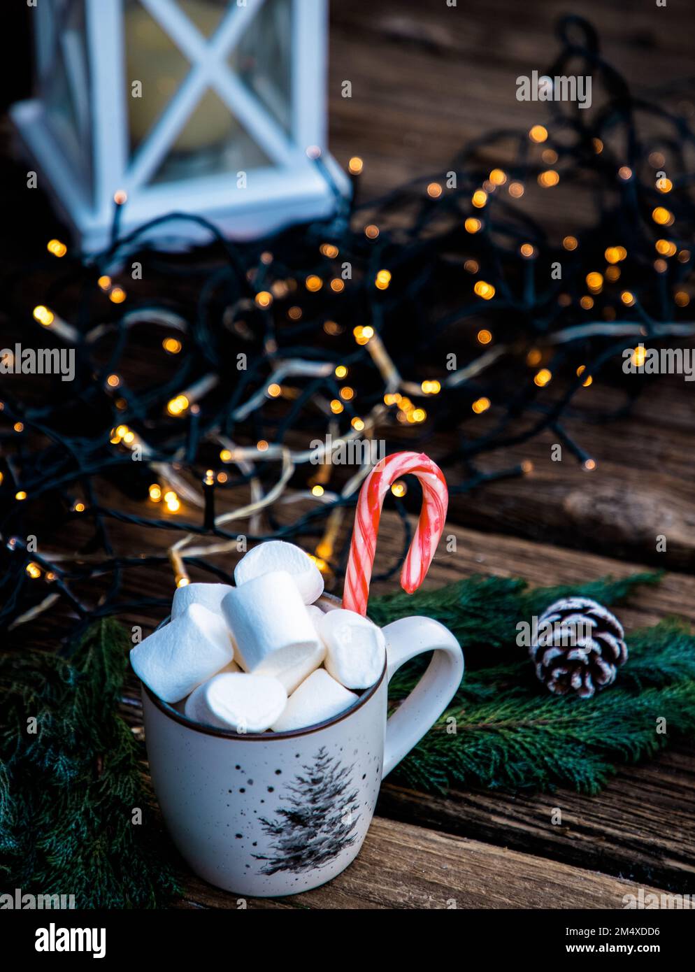 hot Christmas drink with marshmallow on wooden table Stock Photo - Alamy