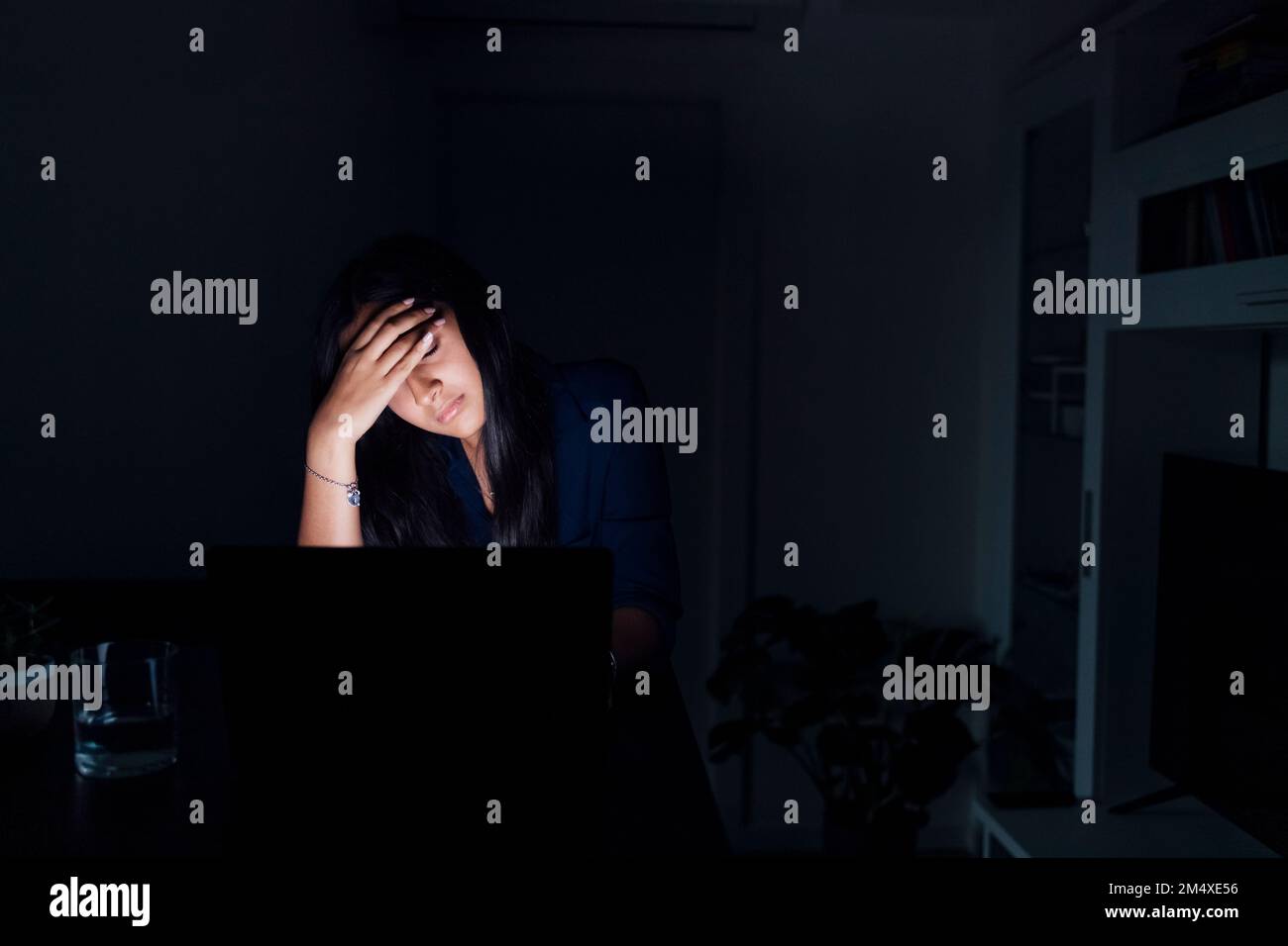 Woman working laptop hours hi-res stock photography and images - Alamy