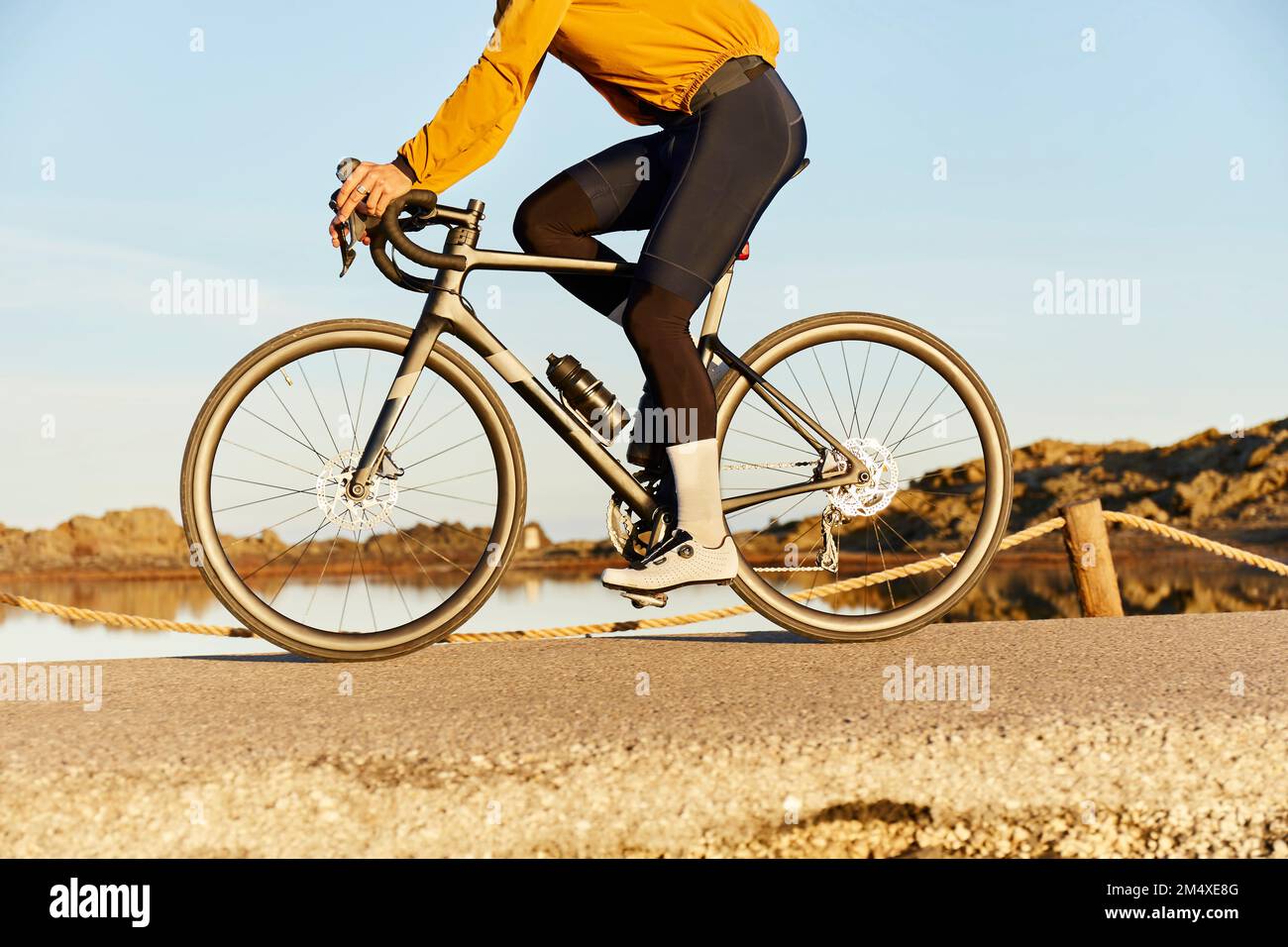 Cyclist side view road hi-res stock photography and images - Alamy