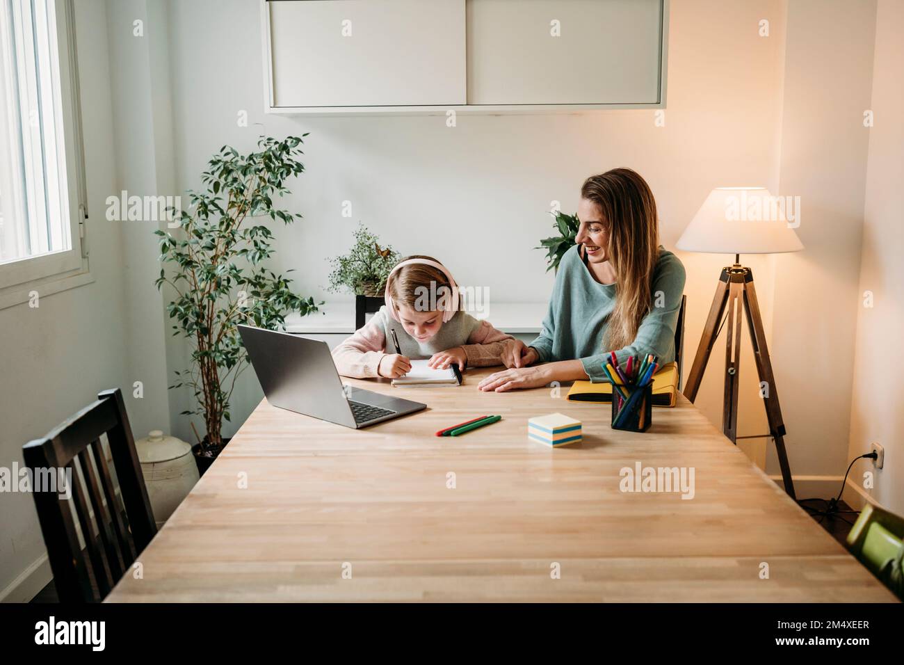 Daughter writing hi-res stock photography and images - Alamy