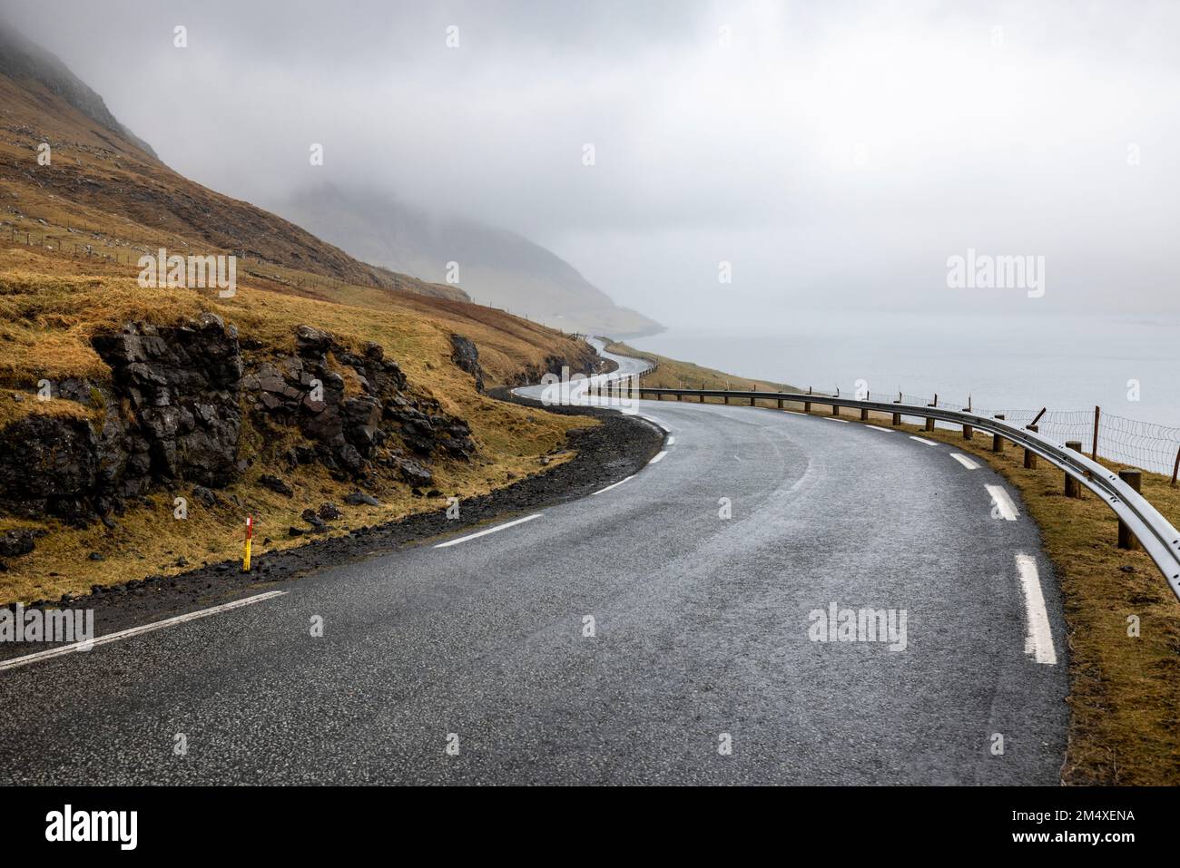 Empty road into mountains hi-res stock photography and images - Alamy