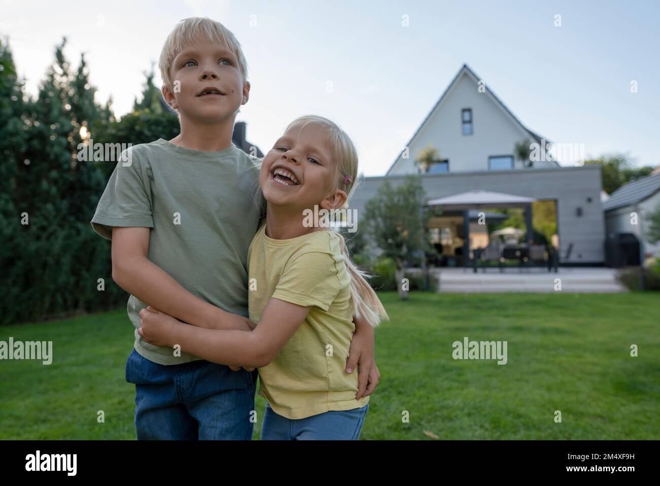 Embracing brother sister in hi-res stock photography and images - Alamy