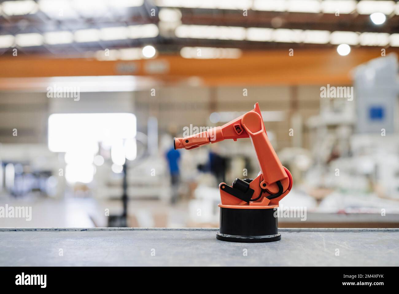 Robotic arm on desk in industry Stock Photo - Alamy