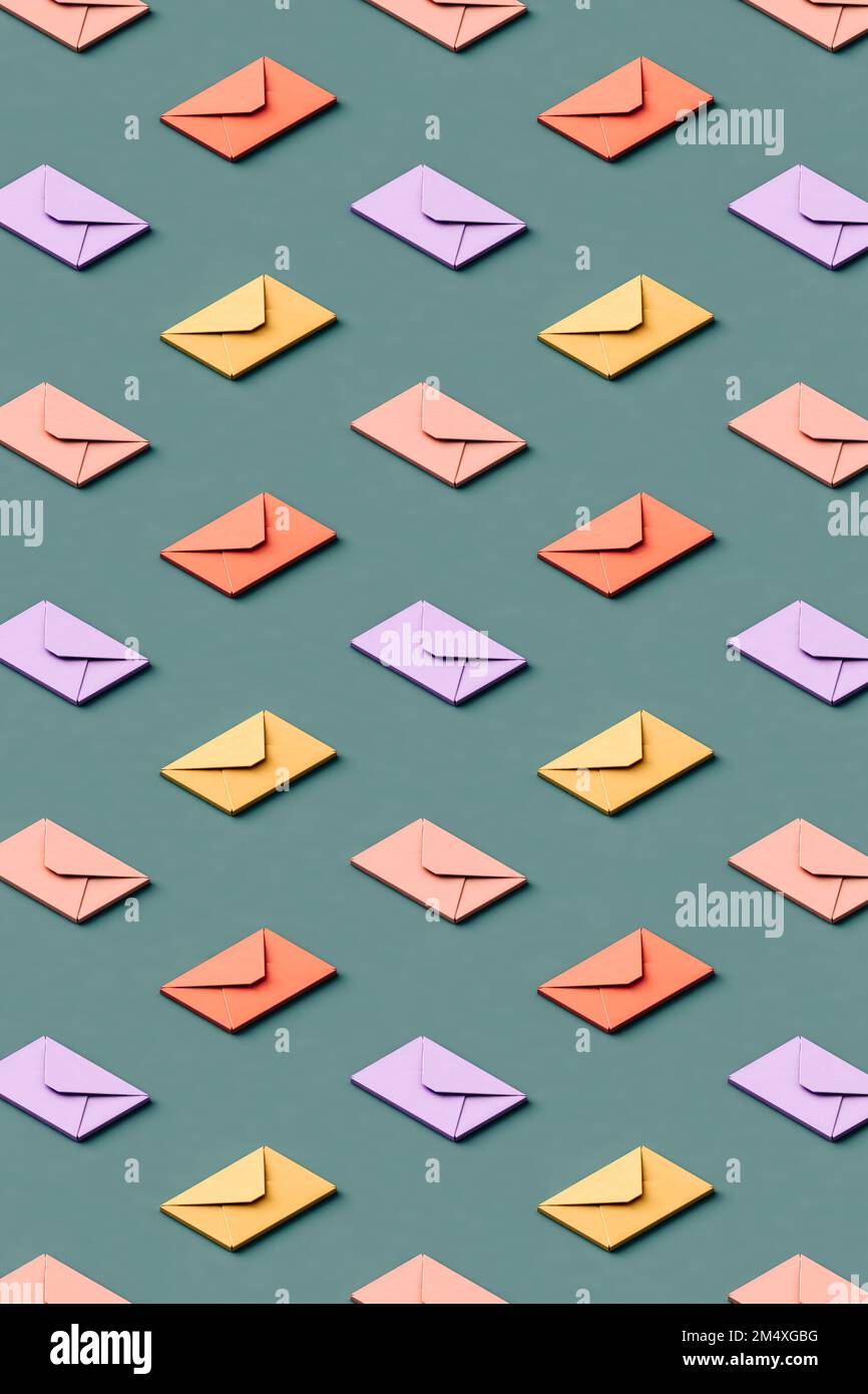 Three dimensional pattern of rows of pastel colored envelopes flat laid ...