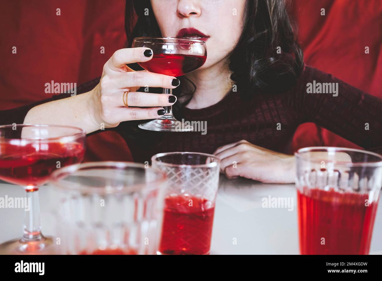 Alcohol addiction woman red hi-res stock photography and images - Alamy