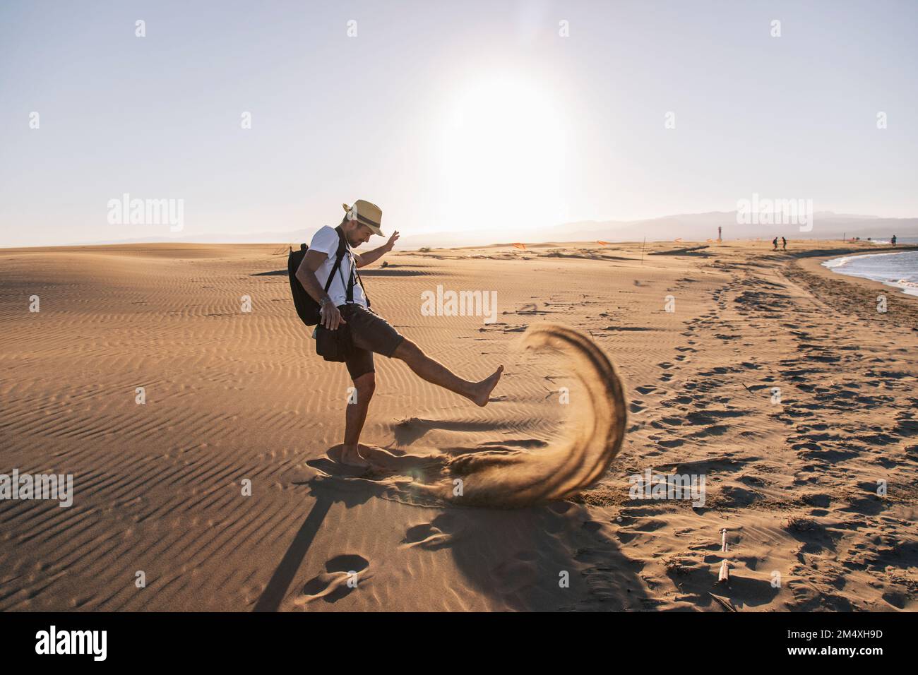Person playing on sand hi-res stock photography and images - Alamy