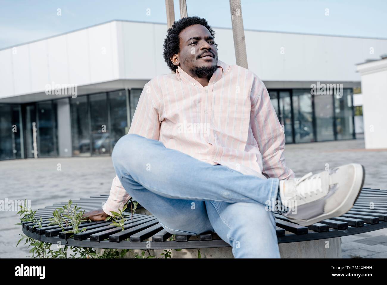 Legs resting on the bench hi-res stock photography and images - Alamy