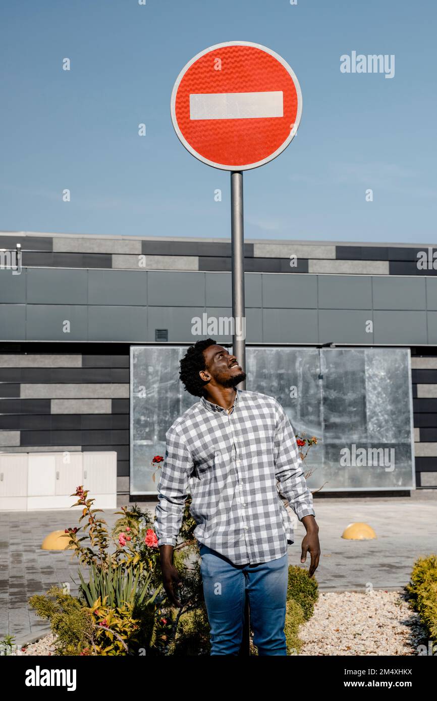 Person looking sign board hi-res stock photography and images - Alamy