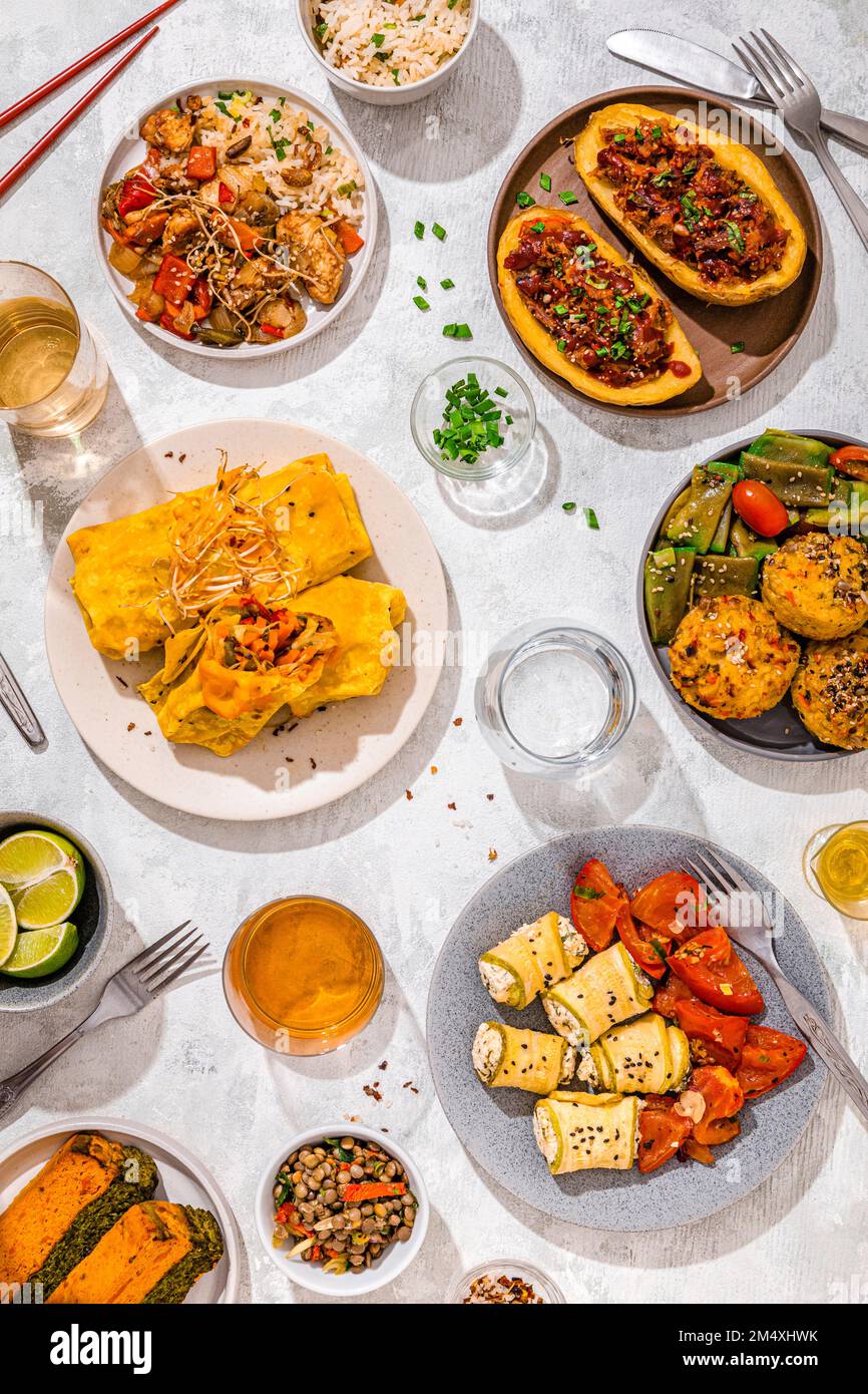 Table filled various dishes including chop suey hi-res stock ...