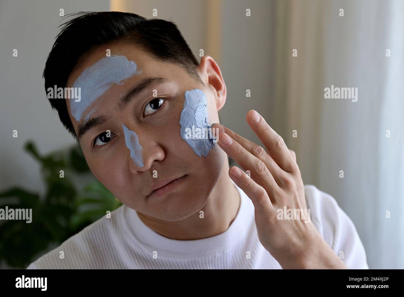 Applying mask hi-res stock photography and images - Alamy