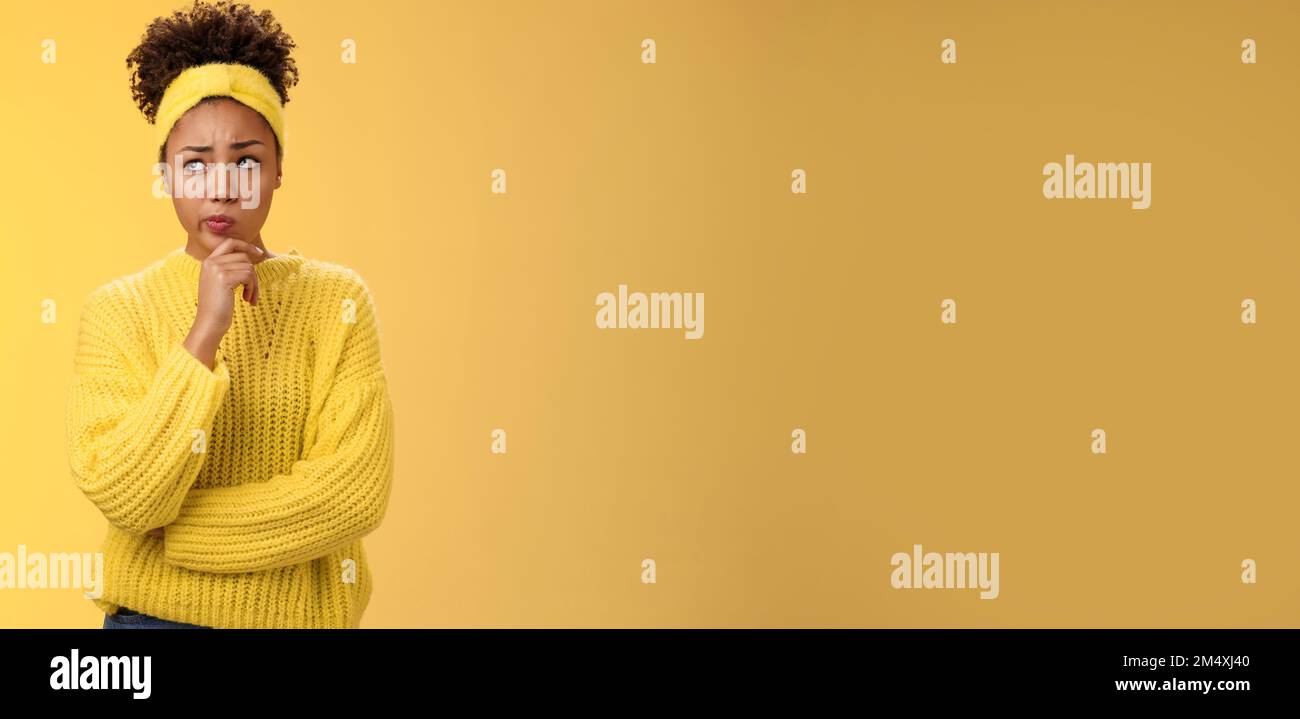 Unsure hesitant worried cute african-american girl face tough decision ...