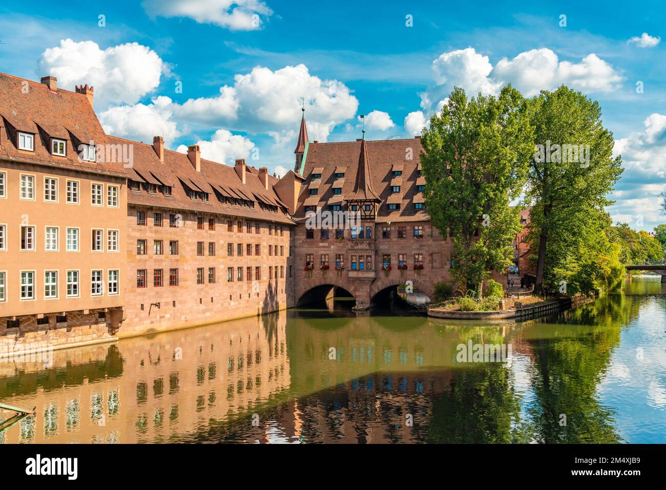 Germany, Bavaria, Nuremberg, Historic Holy Spirit Hospital on Pegnitz ...