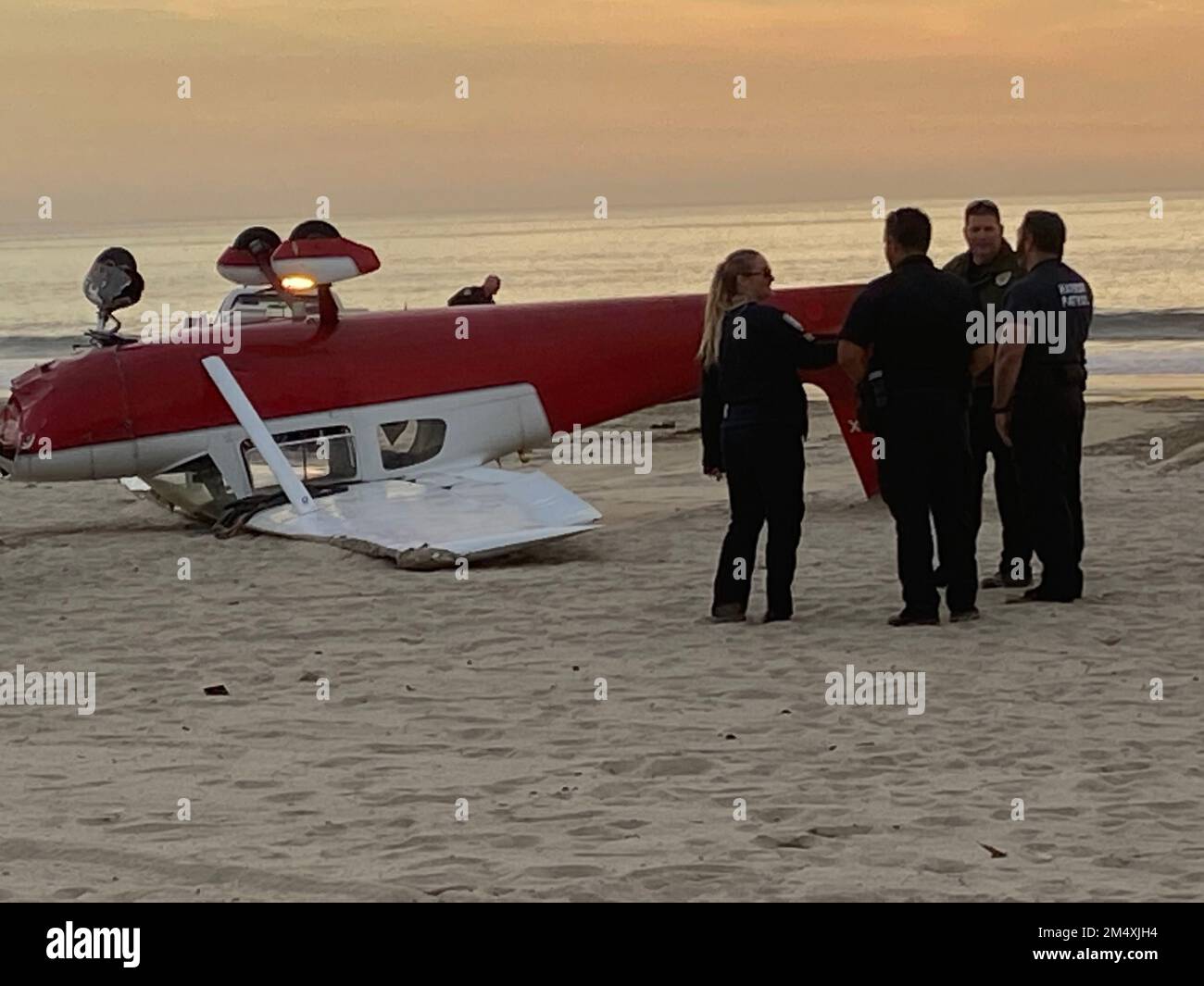 Santa Monica, California, USA. 22nd Dec, 2022. Rescue workers stand ...