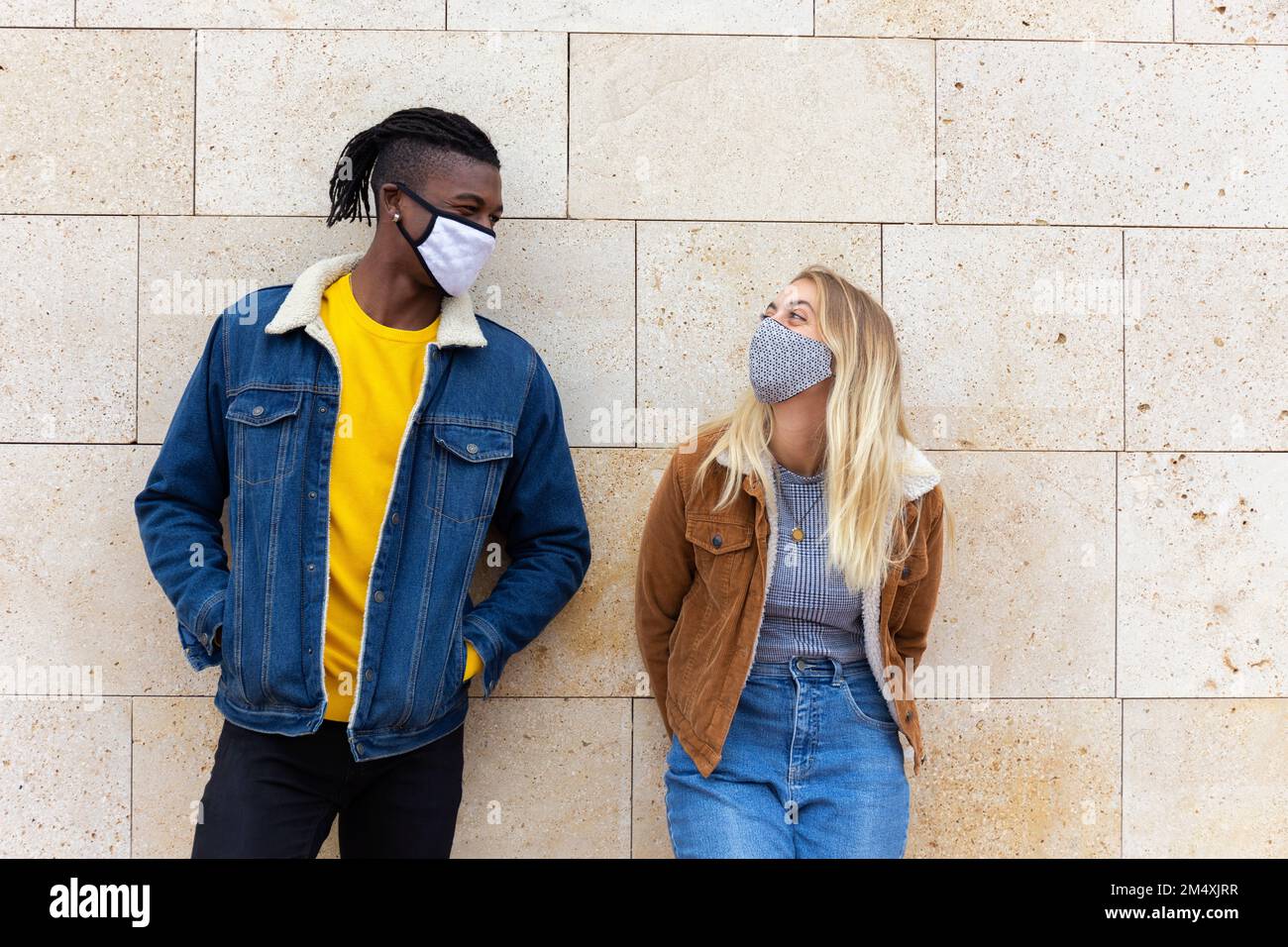 Female friends in protective masks hi-res stock photography and images ...