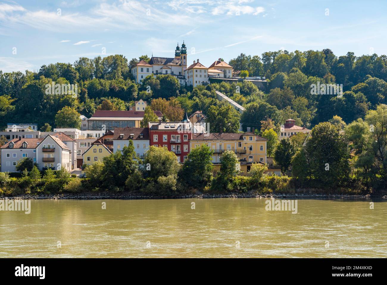 Germany, Bavaria, Passau, Inn River in summer with Wallfahrtskirche ...