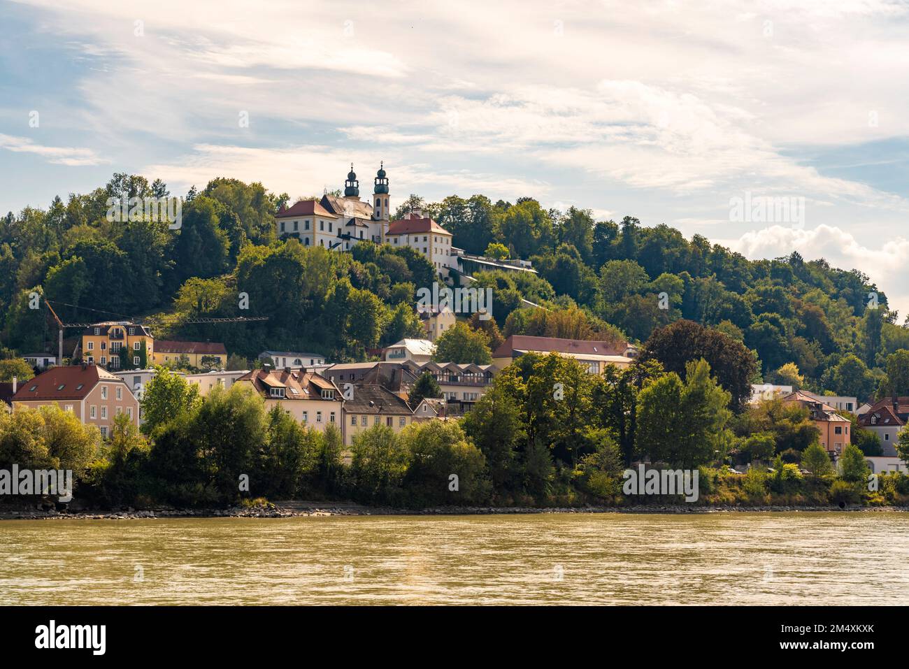 Germany, Bavaria, Passau, Inn River in summer with Wallfahrtskirche ...