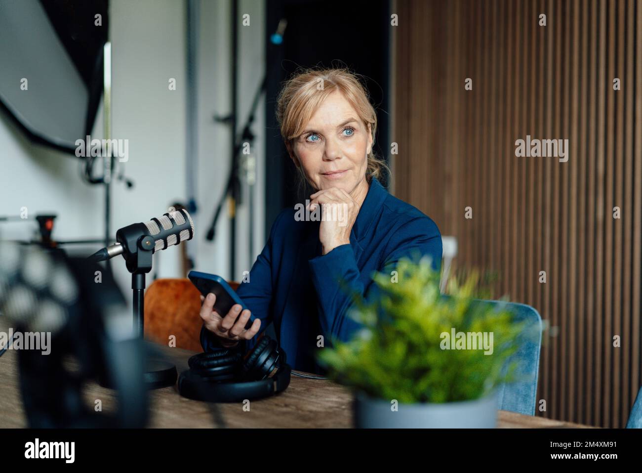 Microphone communication looking away sitting hi-res stock photography ...