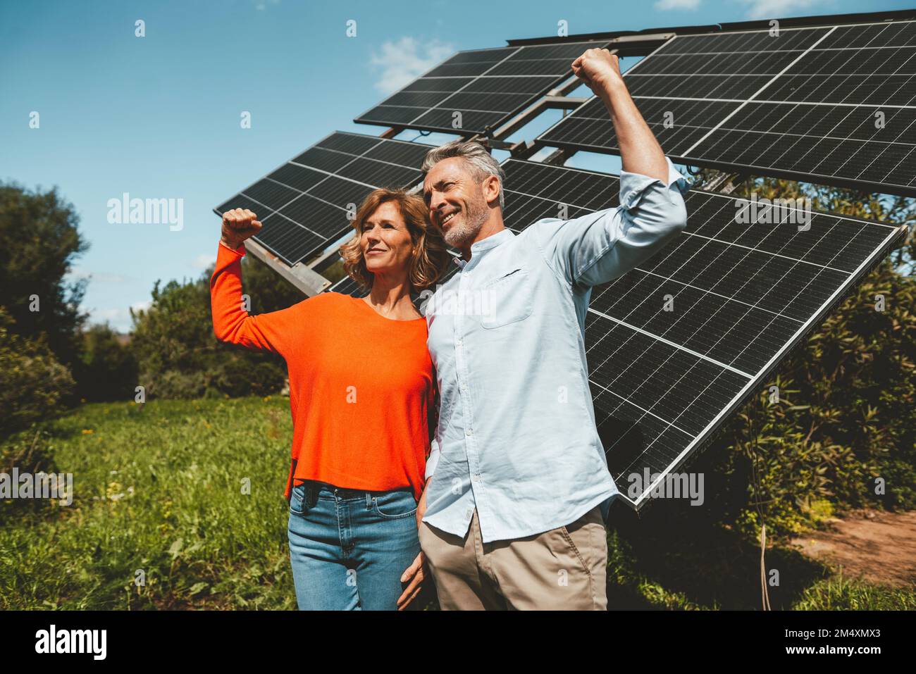 Mature woman flexing muscles outdoors hi-res stock photography and ...