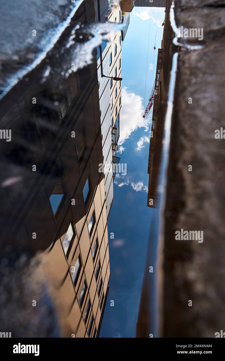 Reflection building in puddle architecture hi-res stock photography and ...