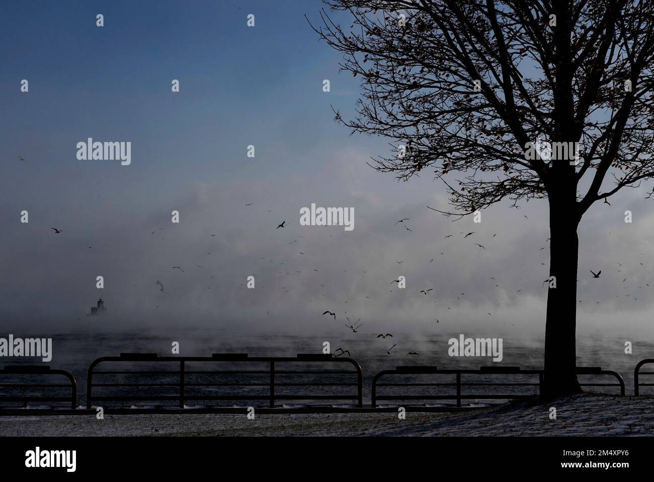 Steam rises off of Lake Michigan as morning temperatures remain below ...