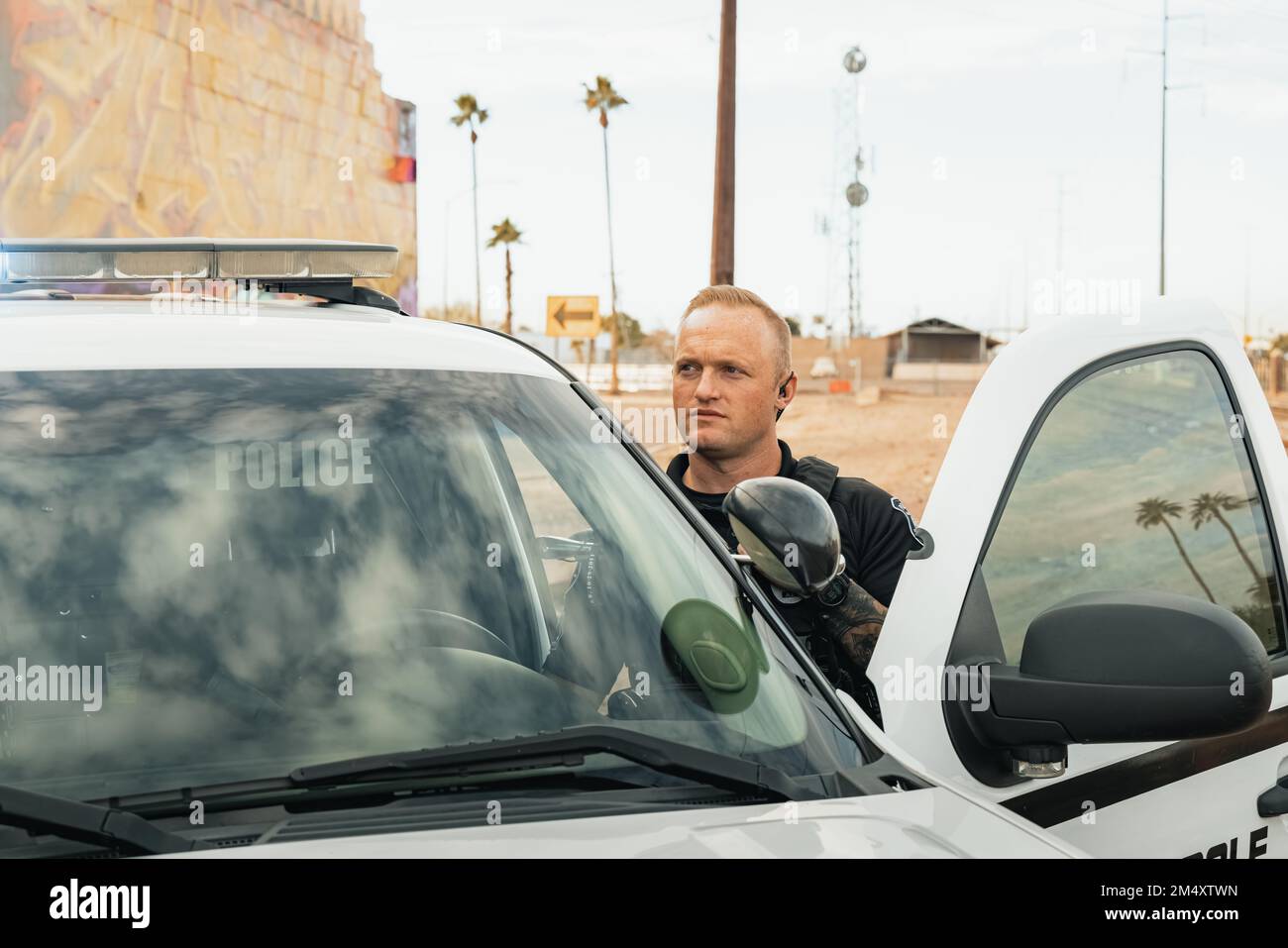 Horizontal image of white male caucasian police officer standing in the ...