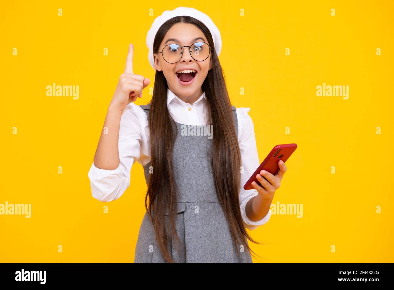 Teenage girl with smart phone. Portrait of teen child using mobile ...
