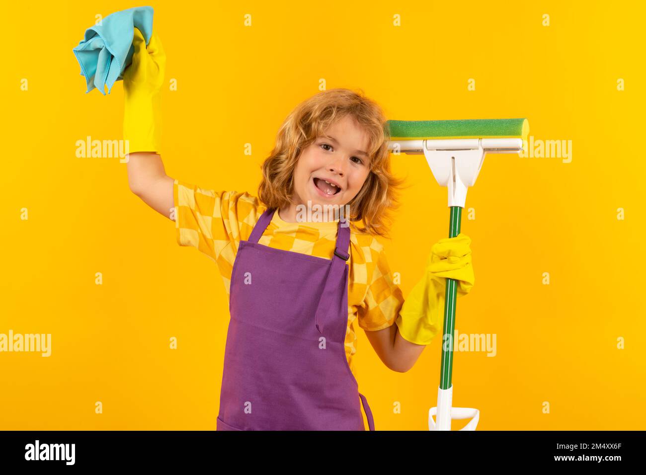 Kid helping with housework, cleaning the house. Cleaning accessory ...