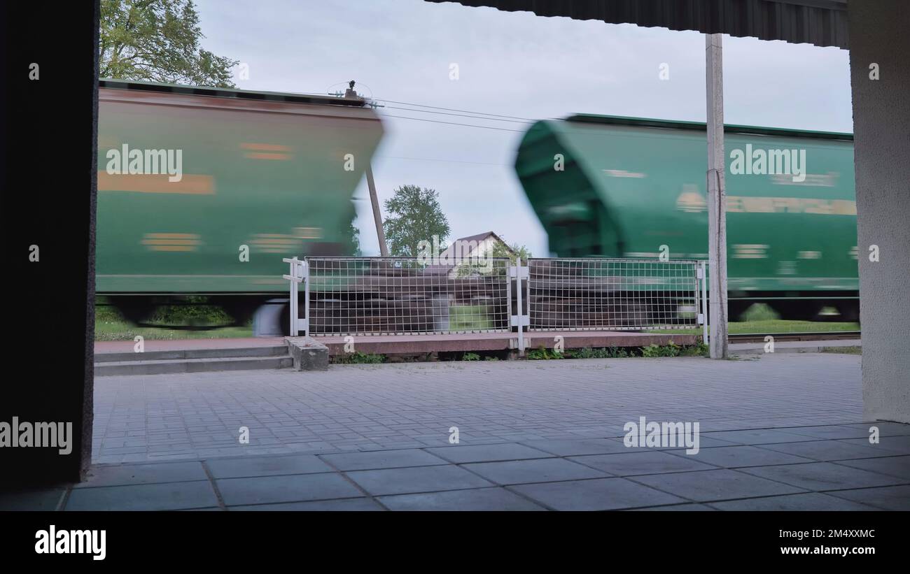 Wagons freight train in motion Stock Photo - Alamy
